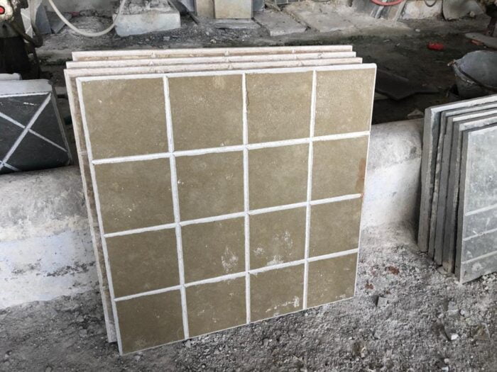 Parking tiles from natural stone tiles offered Naksh stone